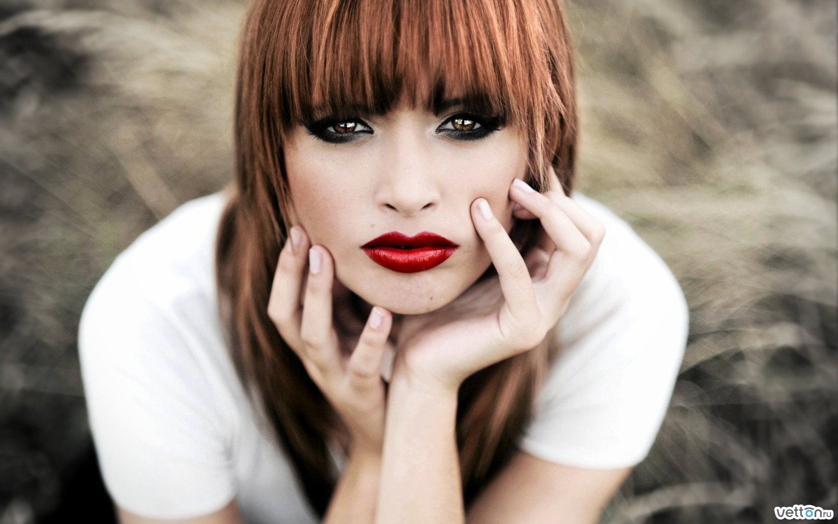 Striking Portrait of a Bold Red-Haired Woman Model